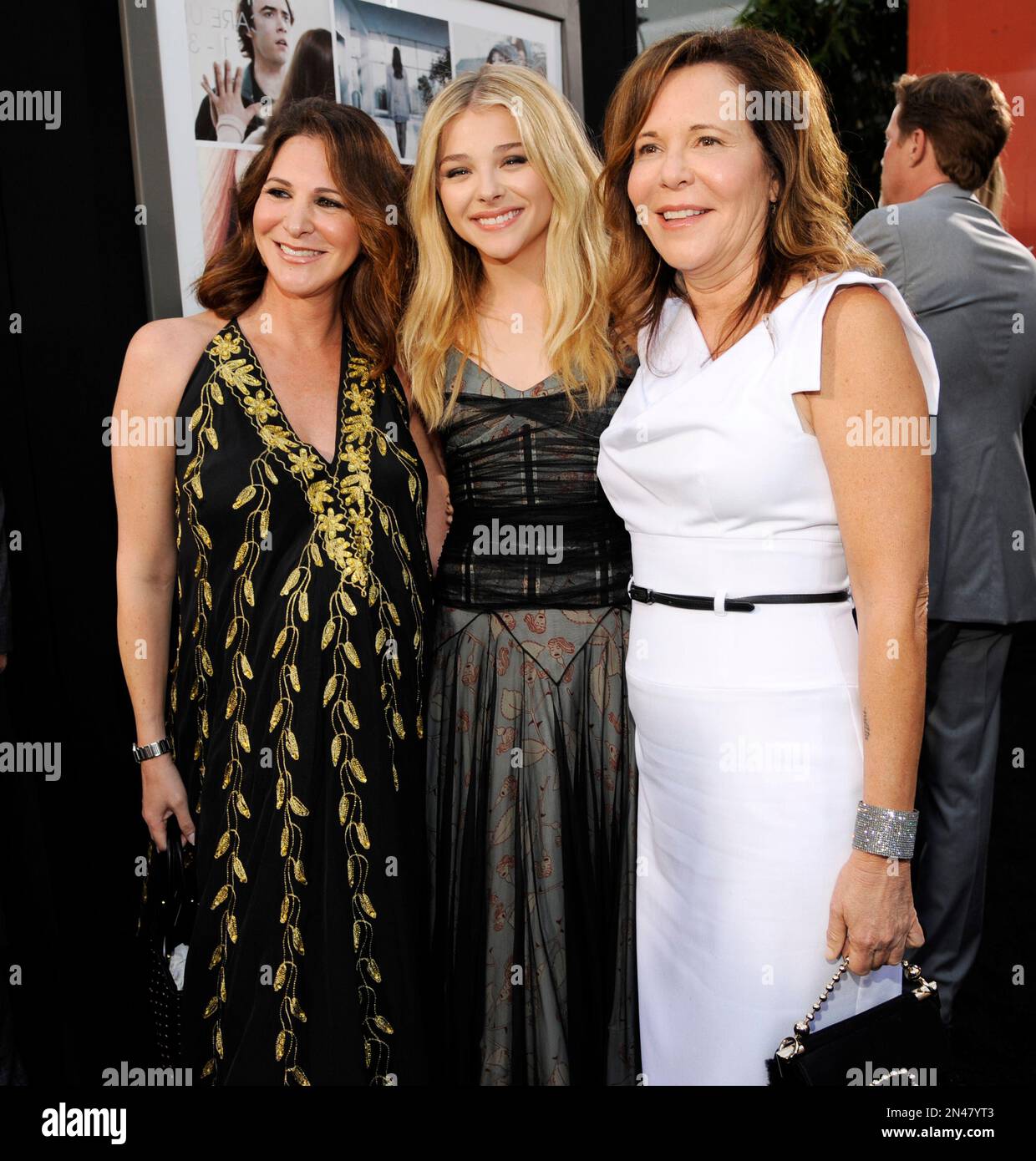 Chloe Grace Moretz, center, a cast member in "If I Stay," poses with ...