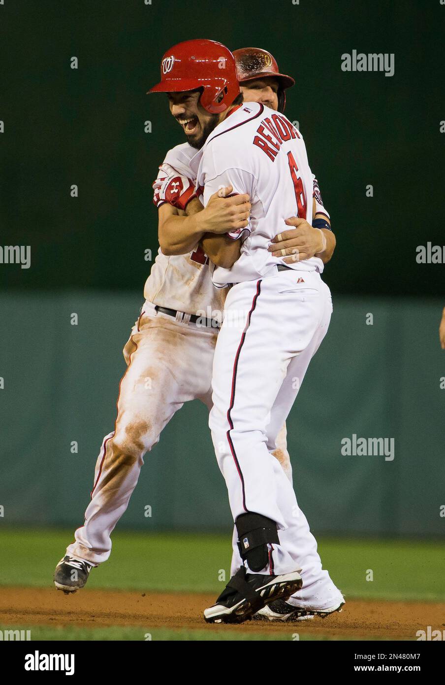 Washington Nationals' Kevin Frandsen, left, hugs teammate Anthony ...