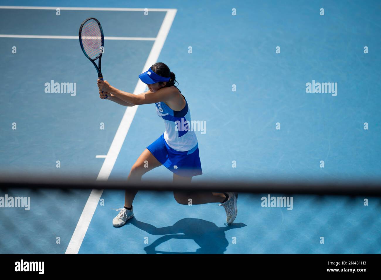 Beautiful female athlete playing tennis. Amateur female tennis player ...