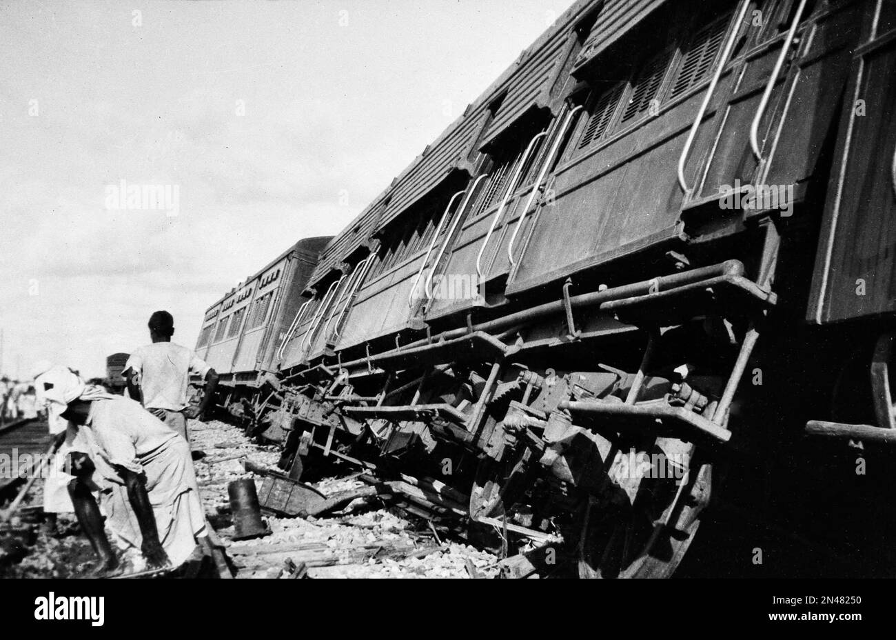 Coaches of an Indian train stand atilt after a Muslim band derailed the ...