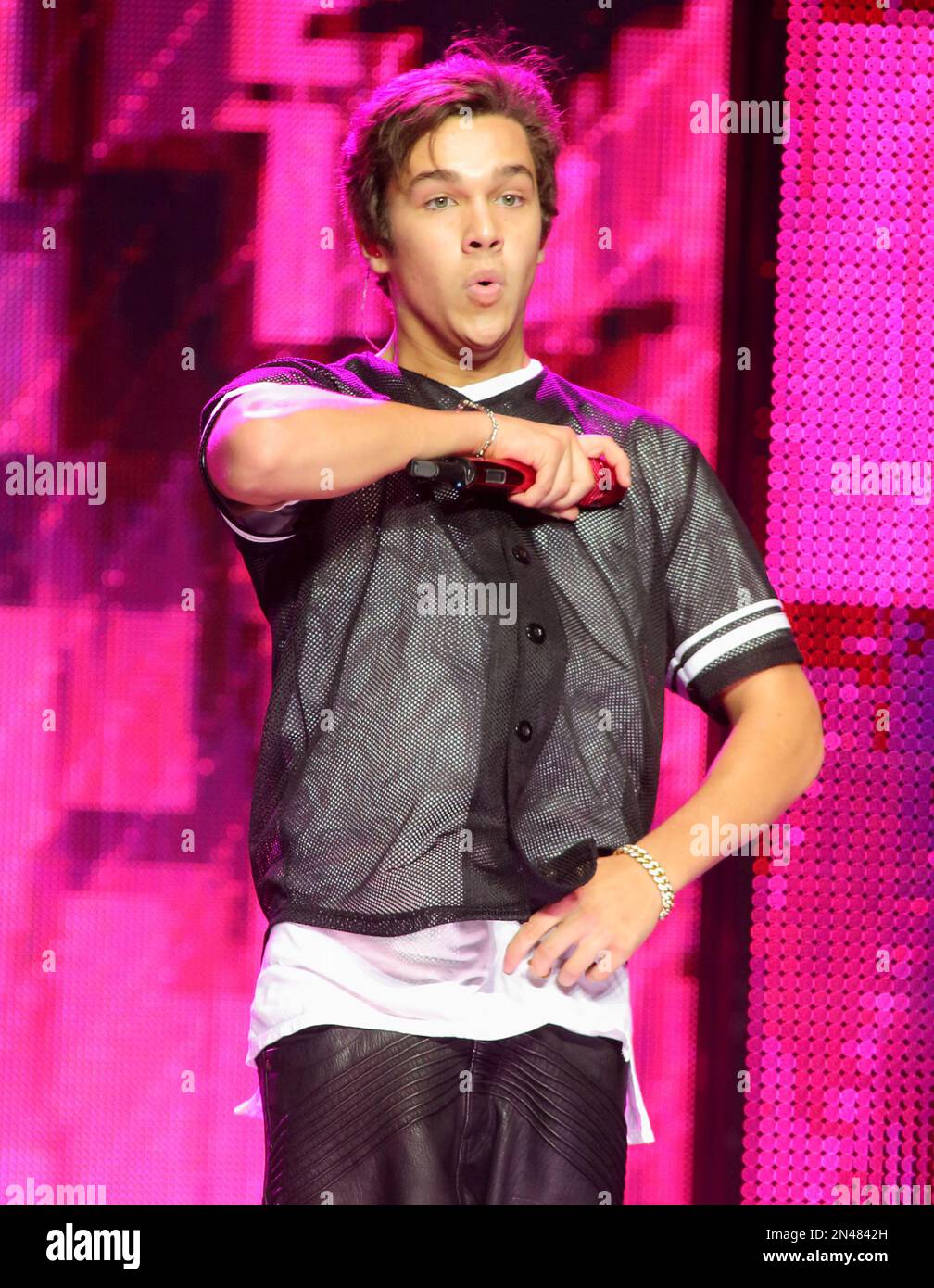 Pop music singer Austin Mahone performs in concert at Pier Six Pavilion ...