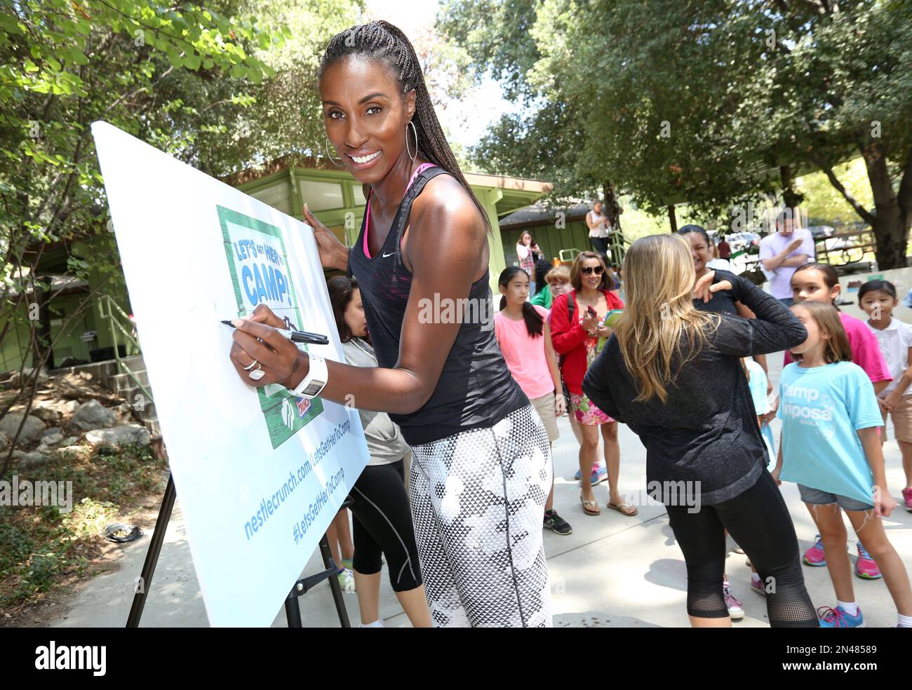 IMAGE DISTRIBUTED FOR NESTLE CRUNCH - Olympian Lisa Leslie visits Girl ...