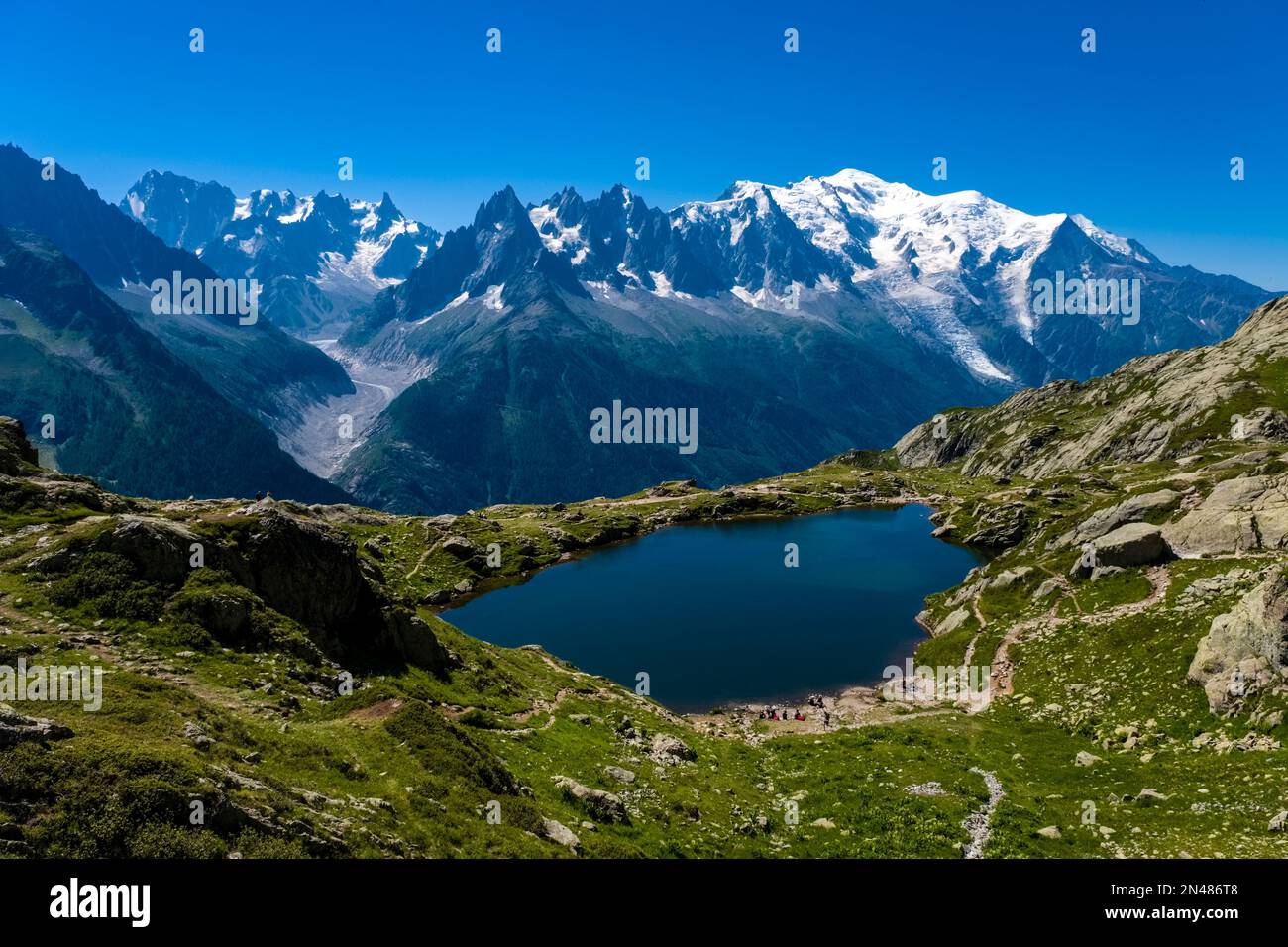 Aerial view on Lacs des Chéserys, the peaks of the Mont Blanc massif in the distance Stock Photo ...
