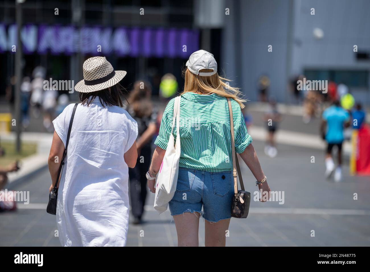 female Professional athlete Tennis player playing on a court in a ...