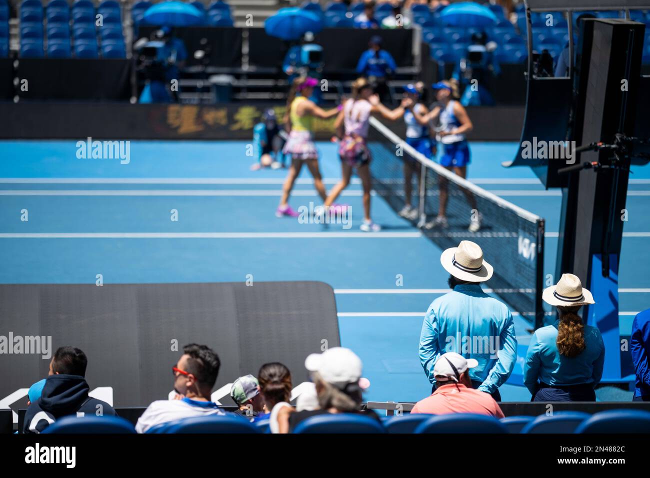 female Professional athlete Tennis player playing on a court in a ...
