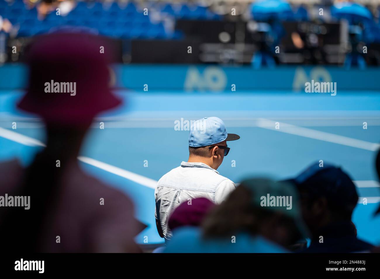 female Professional athlete Tennis player playing on a court in a ...