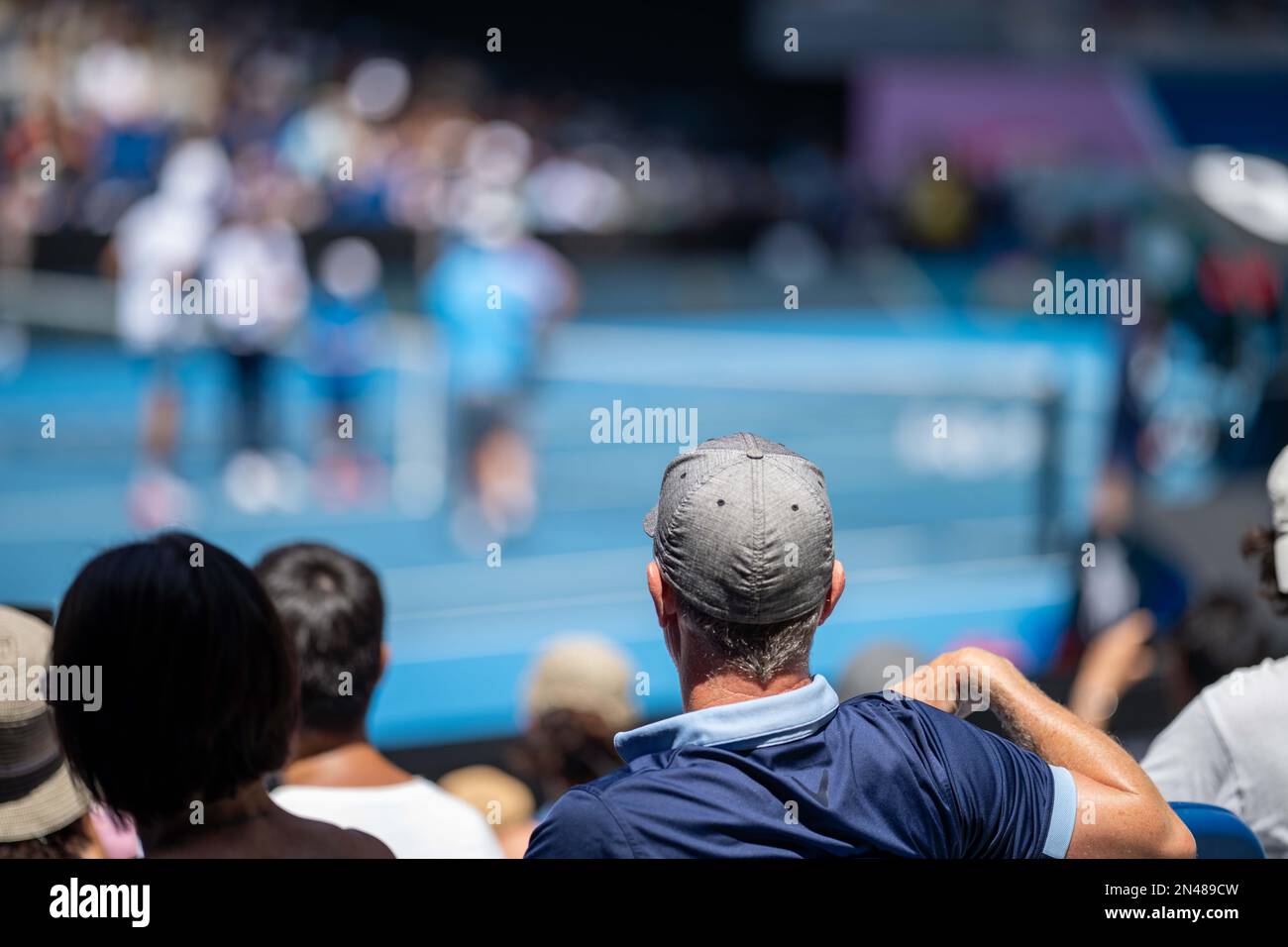 female Professional athlete Tennis player playing on a court in a ...