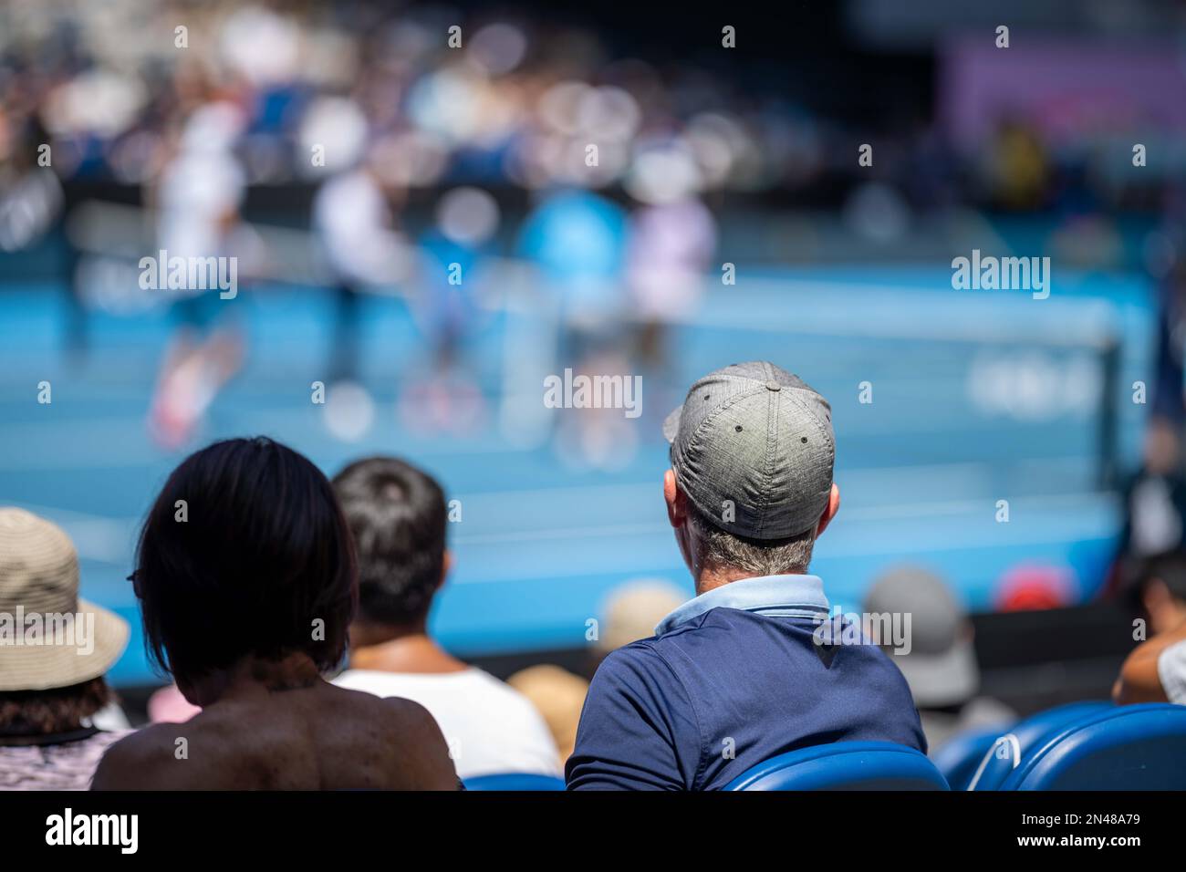 female Professional athlete Tennis player playing on a court in a ...