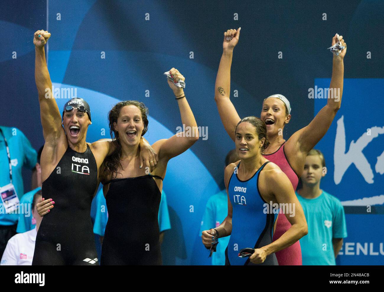 The team of Italy celebrates winning the bronze medal in the women's ...