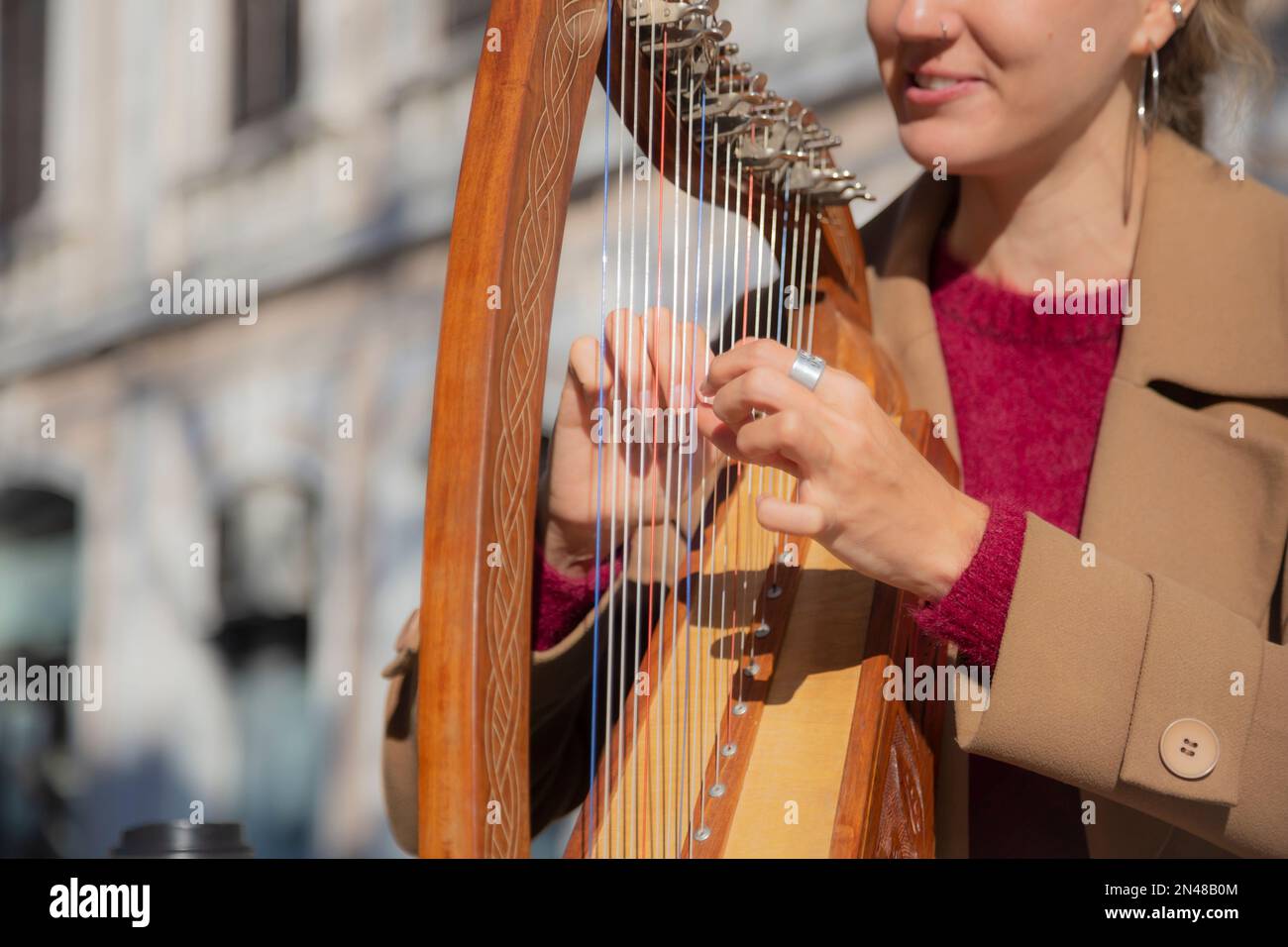 Belgrade, Serbia. November 10th, 2022. Street musician woman playing ...