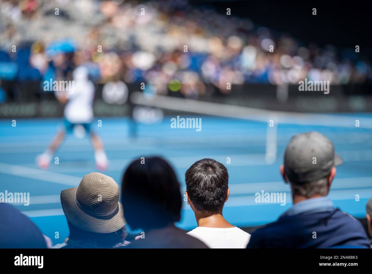 female Professional athlete Tennis player playing on a court in a ...