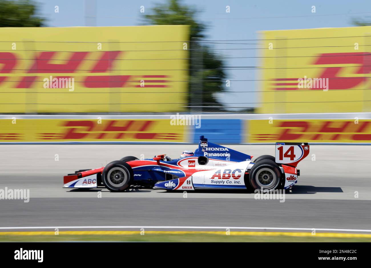 Takuma Sato makes his way through turn four during the ABC Supply ...