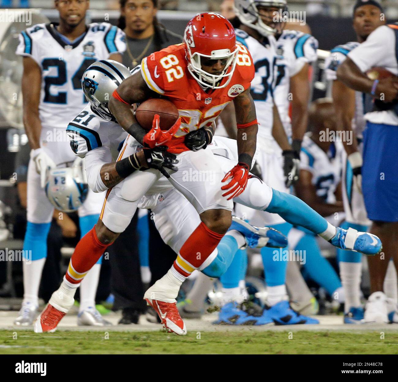 Kansas City Chiefs' Dwayne Bowe (82) is tackled by Carolina Panthers ...