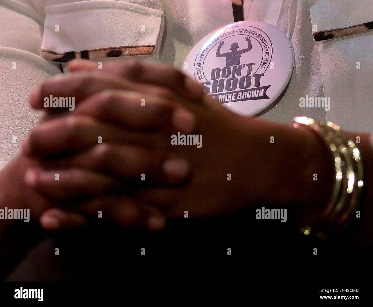 Michael Brown's mother, Lesley McSpadden, wears a don't shoot button ...