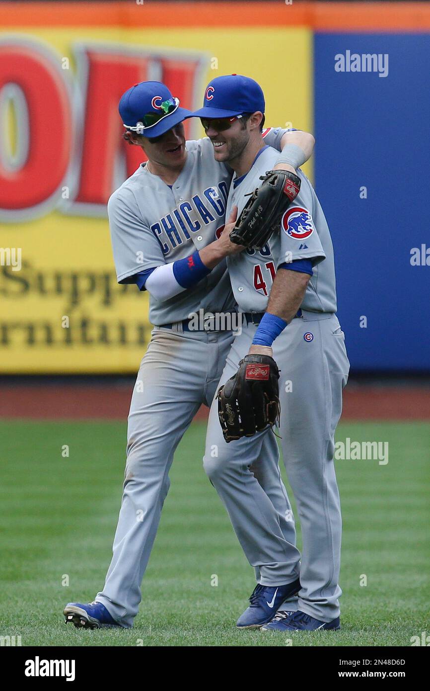 Chicago Cubs center fielder Matt Szczur (41) is hugged by left fielder ...
