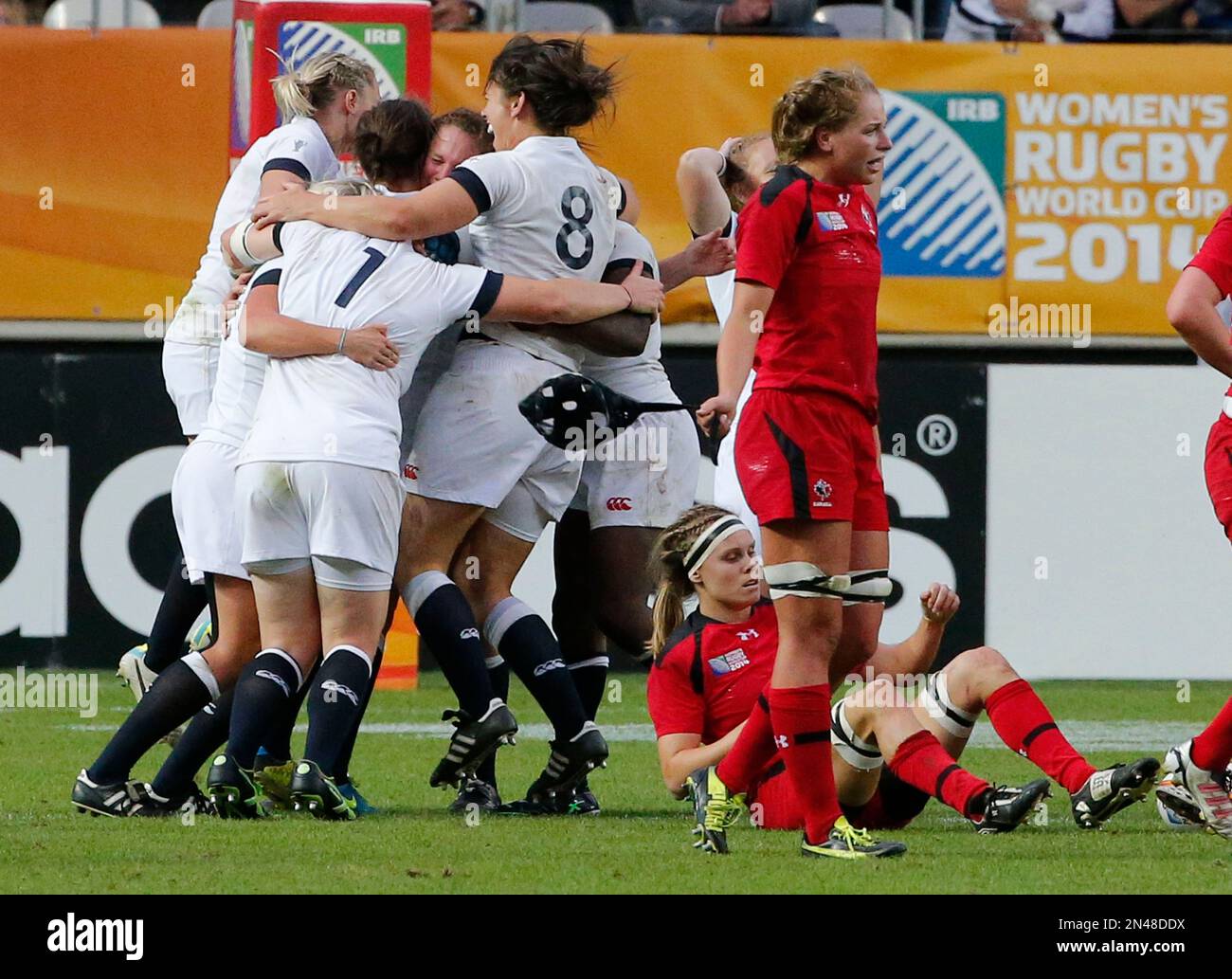 Canada's Andrea Burk, right, and Karen Paquin react after England won ...