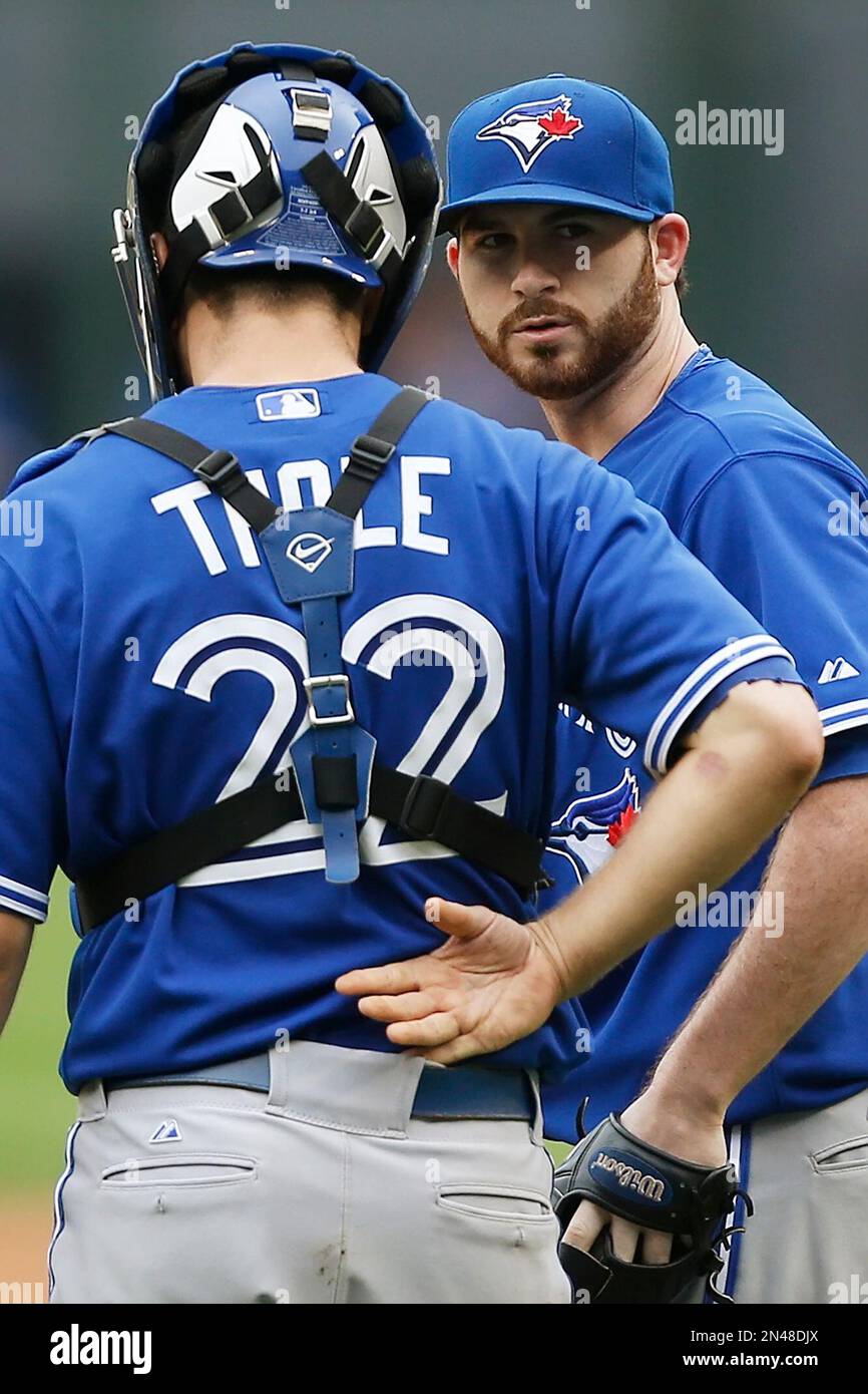 Toronto Blue Jays starting pitcher Drew Hutchison, right, meets with ...