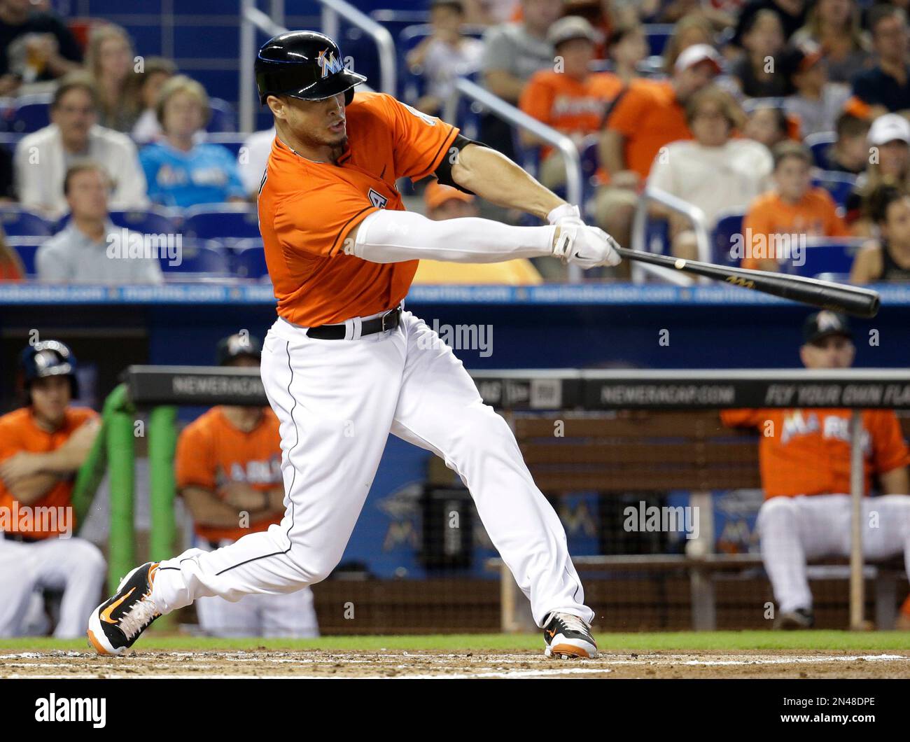 Miami Marlins' Giancarlo Stanton hits a three-run home run in the first ...