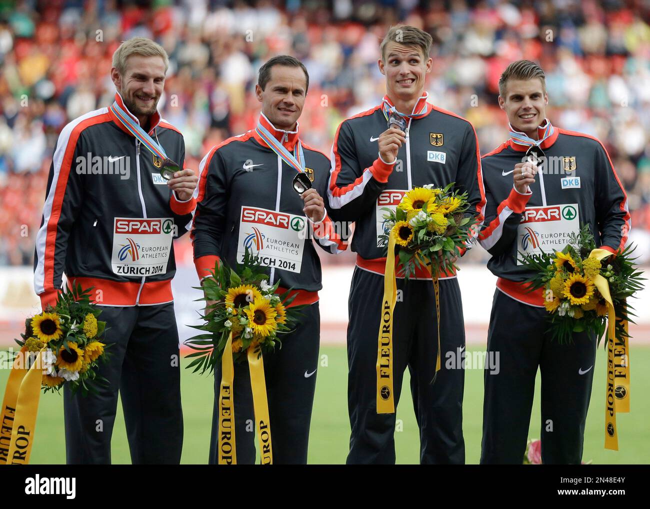 The German 4x100m relay team sport their silver medals during the ...