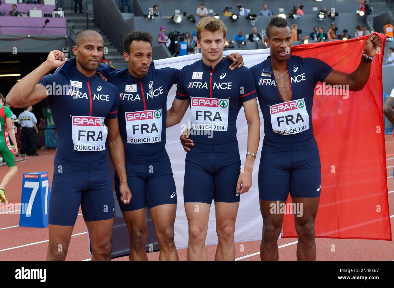 The bronze medal winning French relay team pose for a photograph after ...
