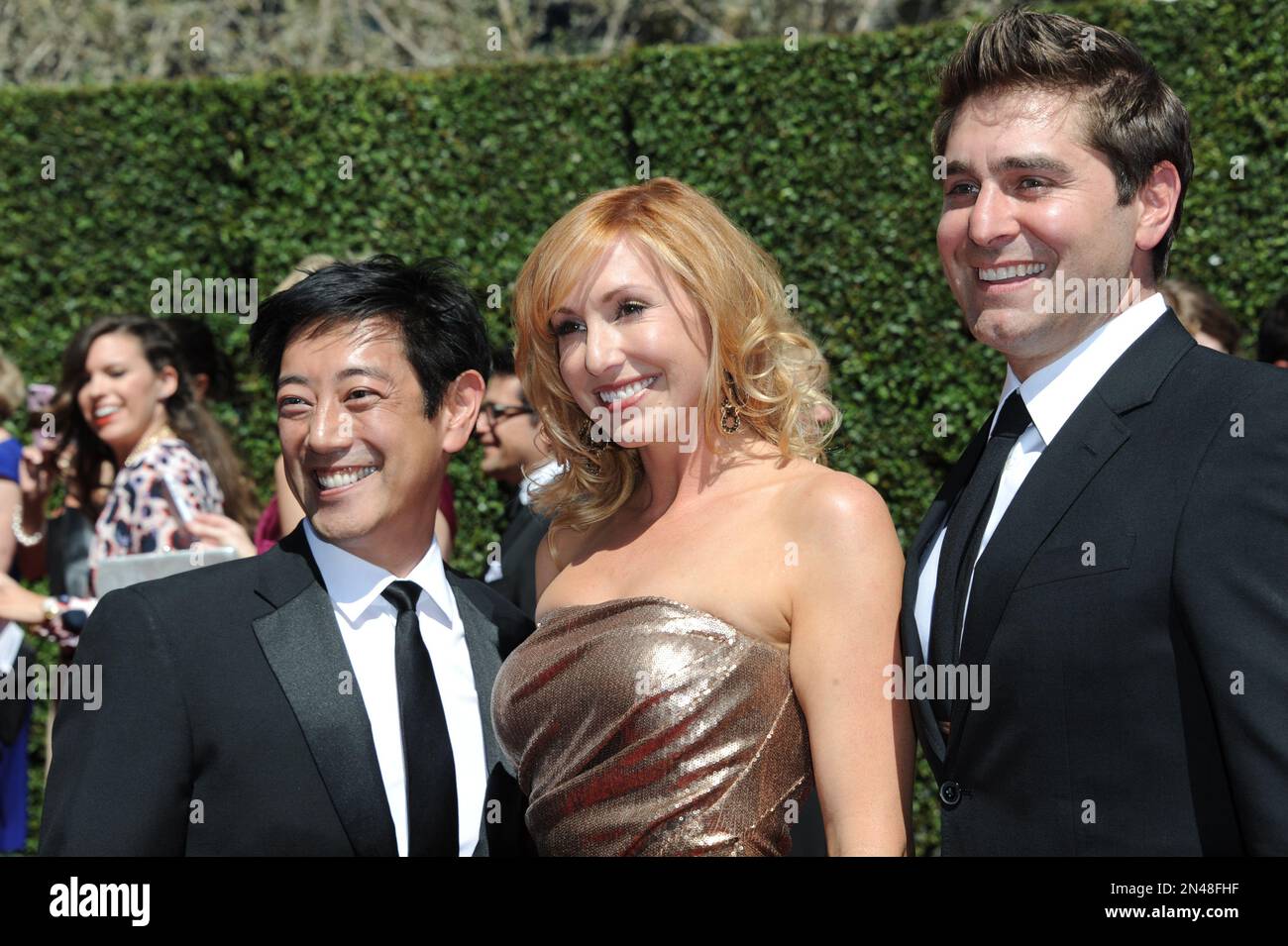 From left, Grant Imahara, Kari Byron, and Tory Belleci arrive at the ...