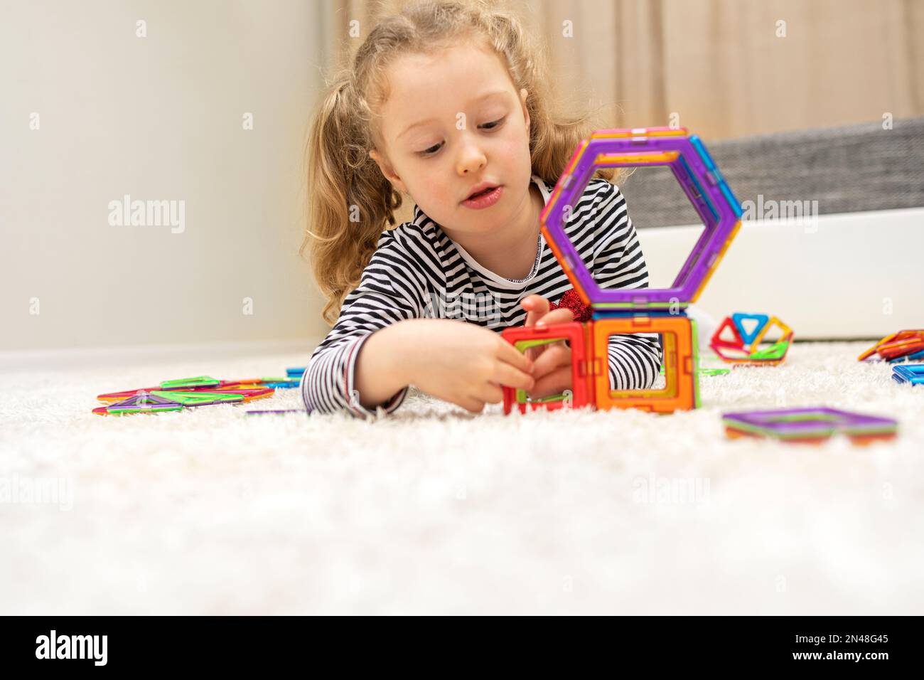 Figures from the magnetic designer Stock Photo - Alamy