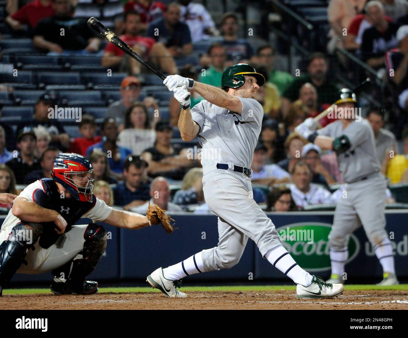 Oakland Athletics' John Jaso hits a solo home run against the Atlanta ...