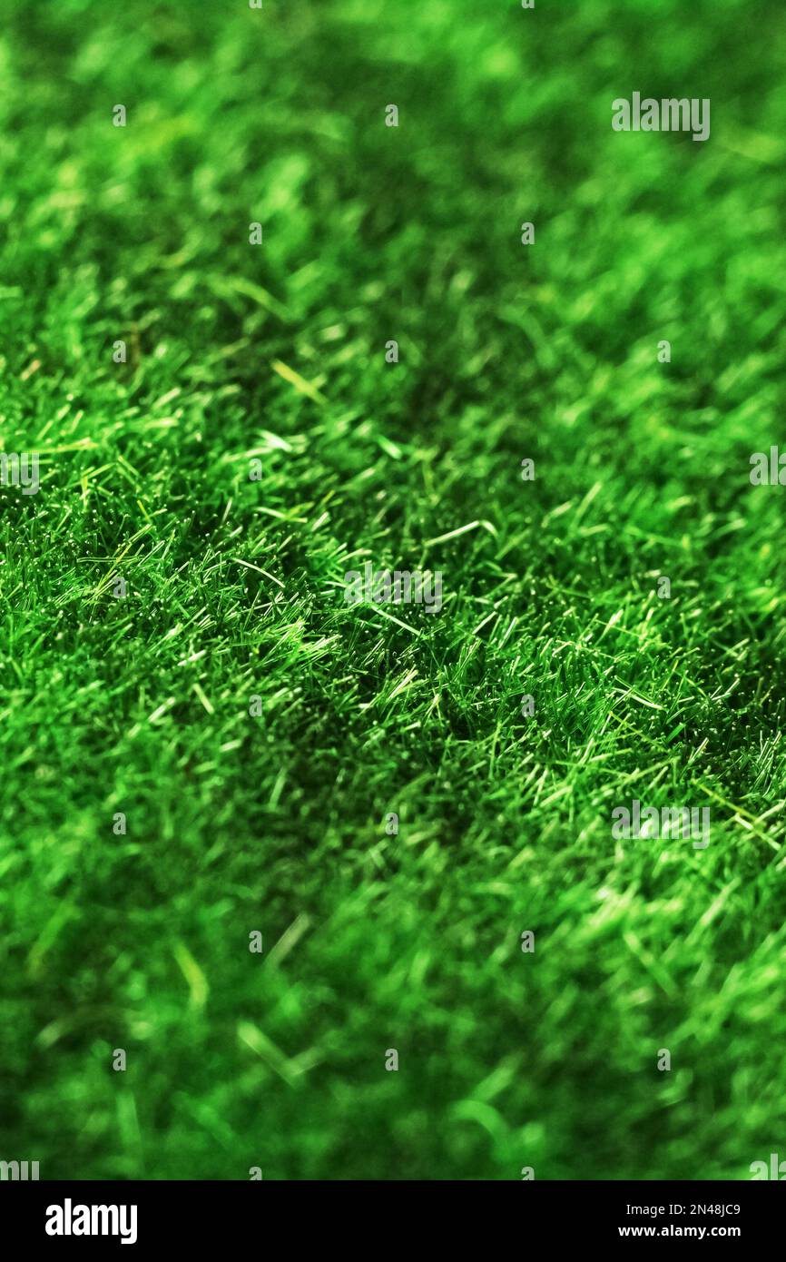Artificial green grass close up, background or texture Stock Photo - Alamy