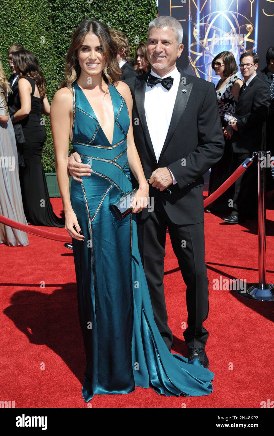 Nikki Reed, left, and Seth Reed arrive at the 2014 Creative Arts Emmys ...
