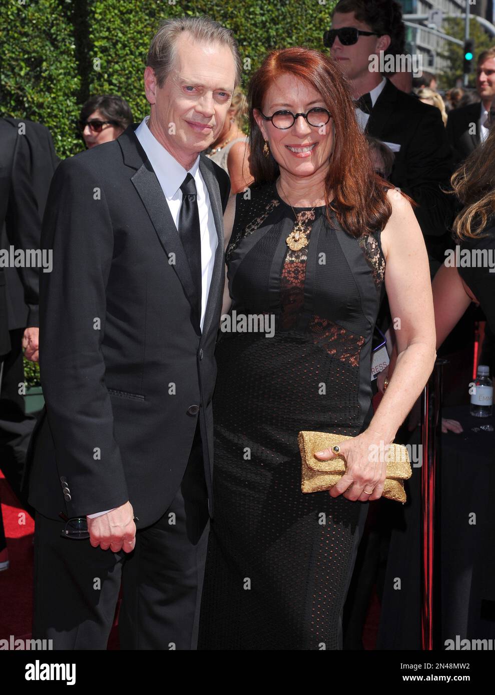 Steve Buscemi, left, and Jo Andres arrive at the Television Academy's ...