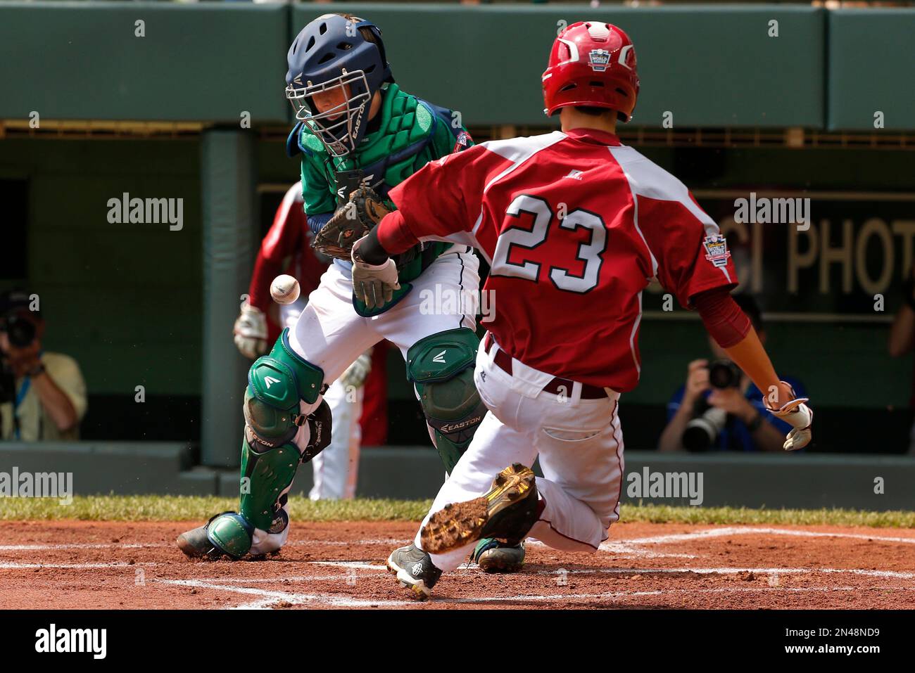 Lynnwood's Colton Walsh (23) scores as the ball gets away from Rapid ...
