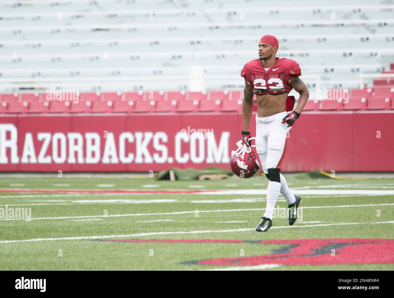 Arkansas defensive back Tevin Mitchel (23) runs onto the field during a ...