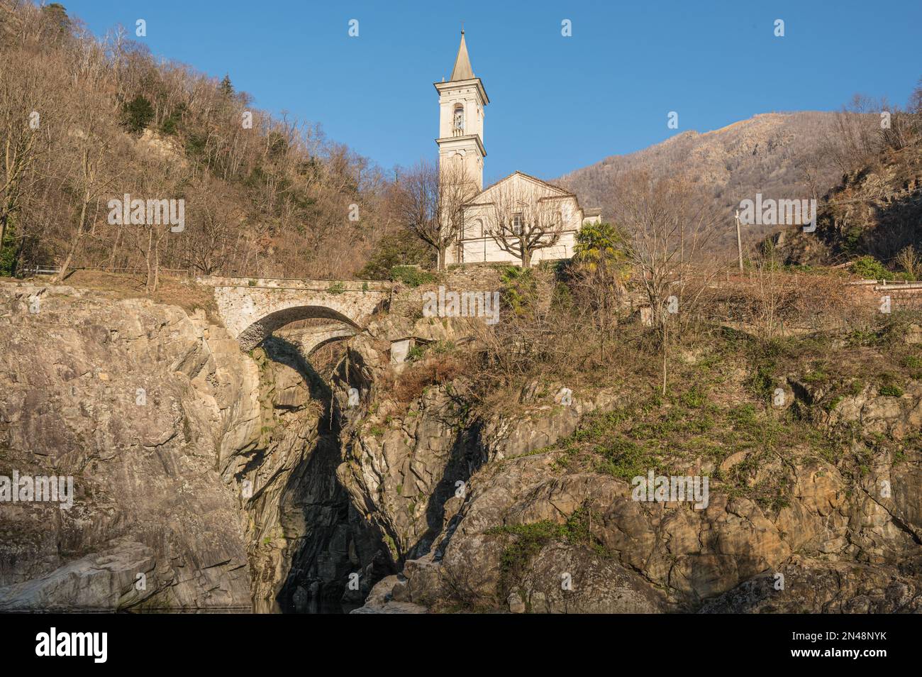 The beautiful ravine of Sant'Anna with the church reflected in the ...