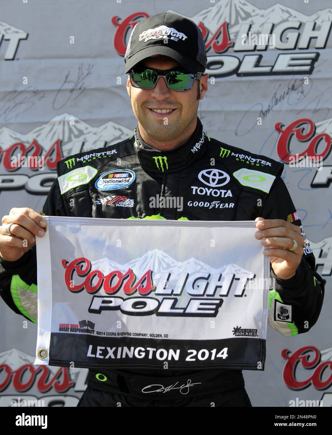 Sam Hornish Jr. holds the pole position flag after qualifying for the ...