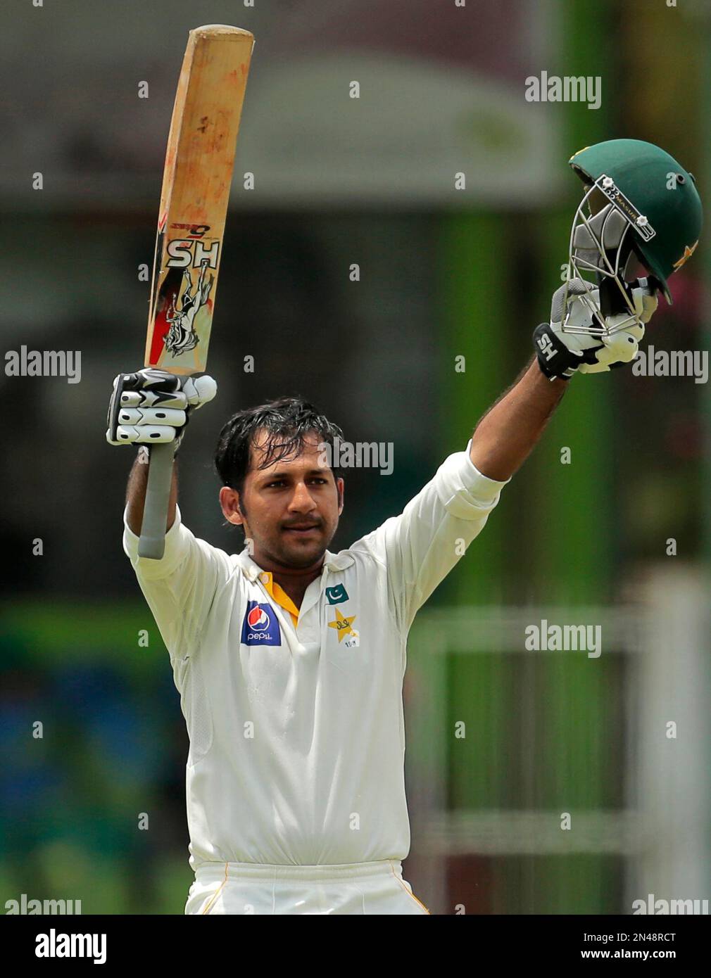 Pakistani batsman Sarfraz Ahmed celebrates scoring a century during the ...