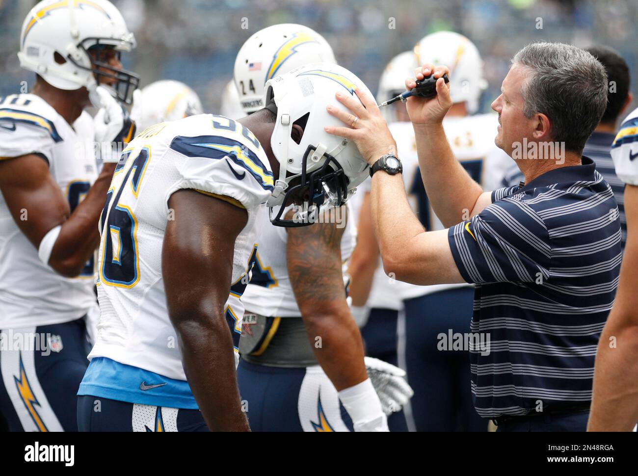 San Diego Chargers inside linebacker Donald Butler, left, has air added ...