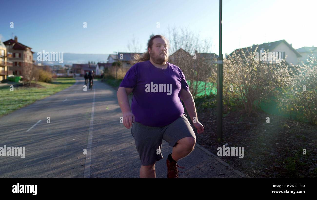 Obese male stretching before sport hi-res stock photography and images ...