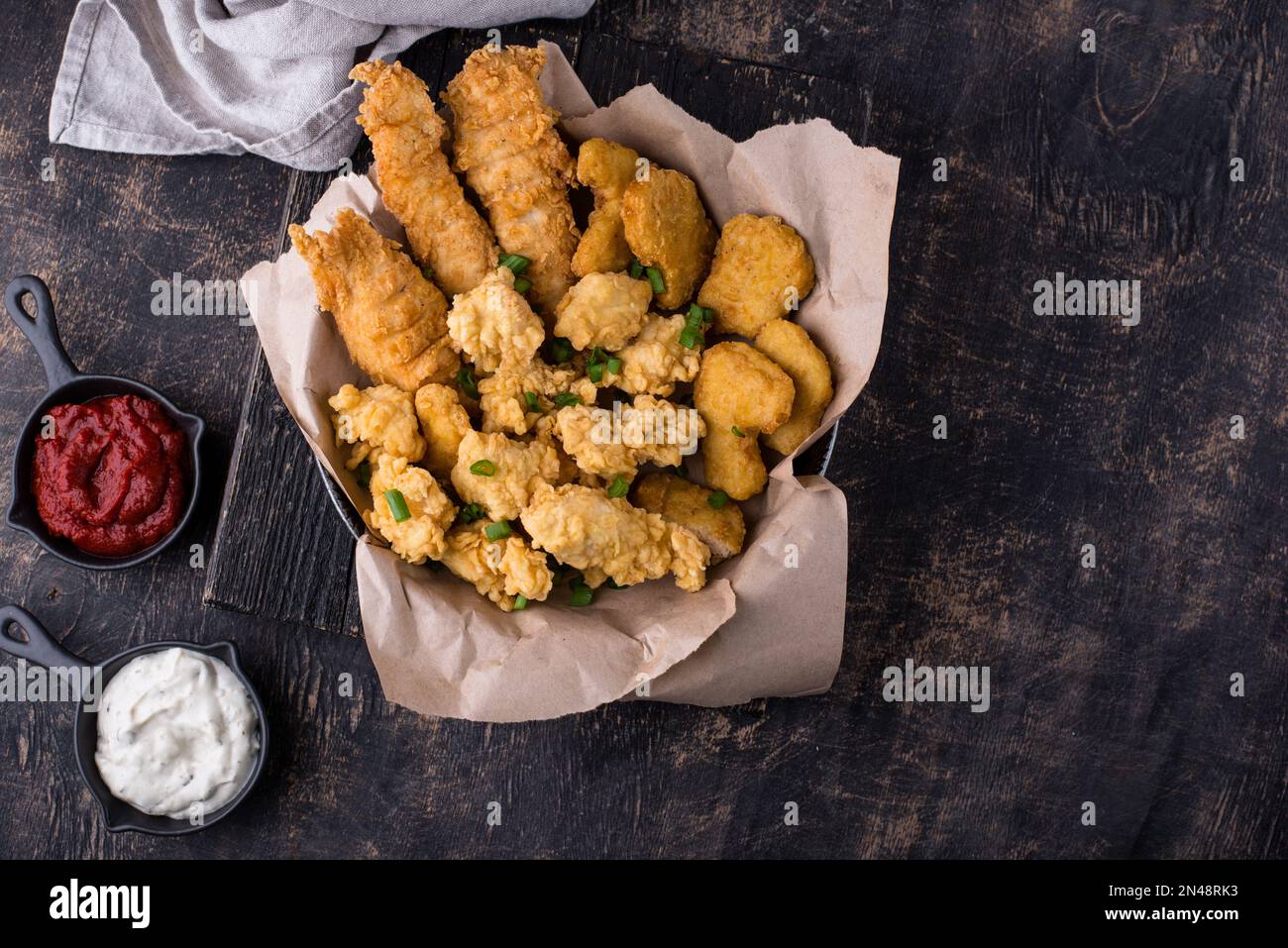 Chicken nuggets, strips and bites Stock Photo - Alamy