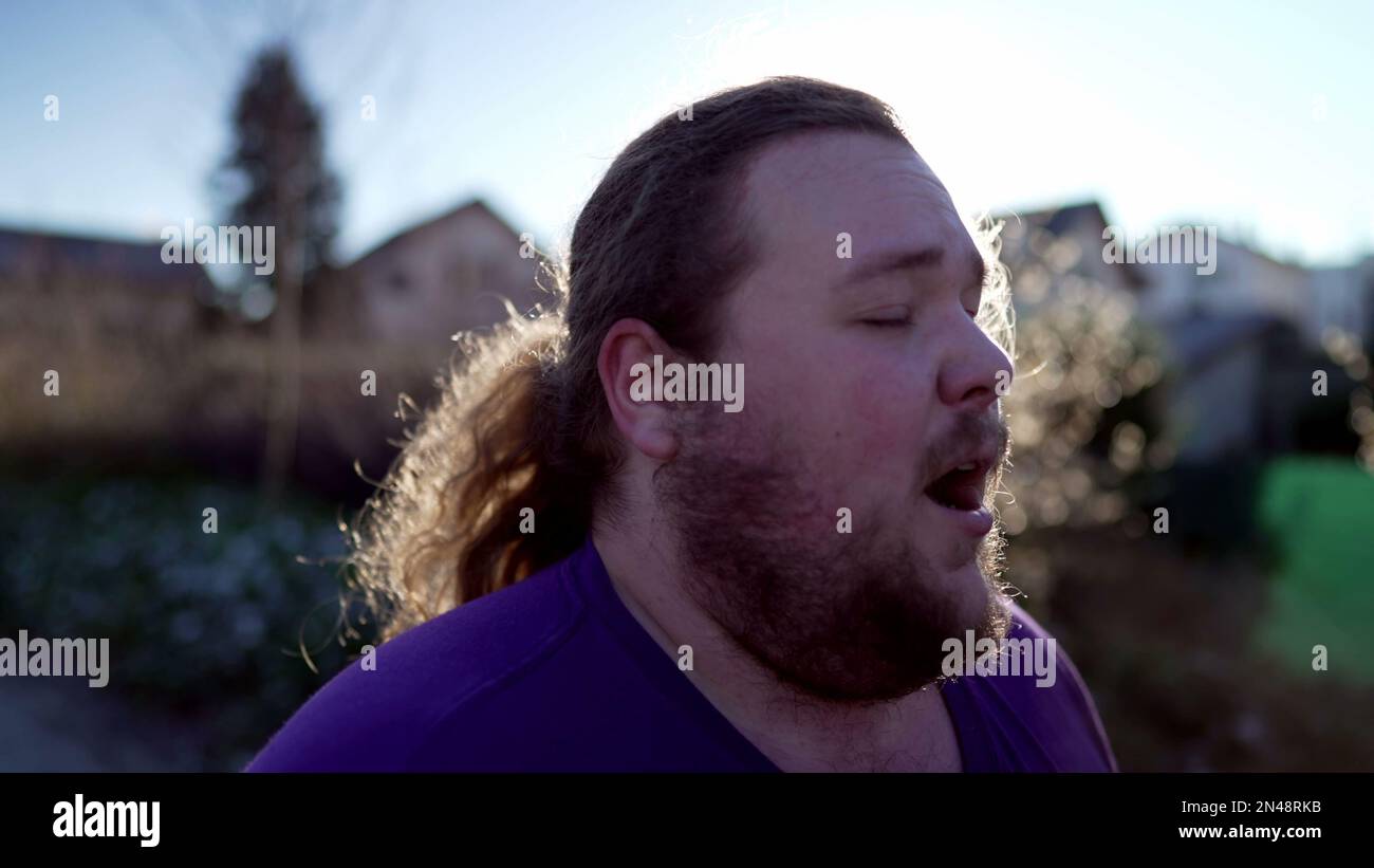 Person overweight taking deep breath hi-res stock photography and ...