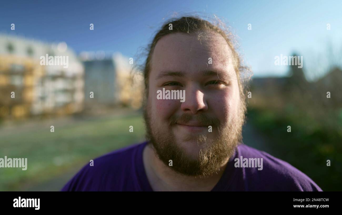 Happy overweight young man standing hi-res stock photography and images ...