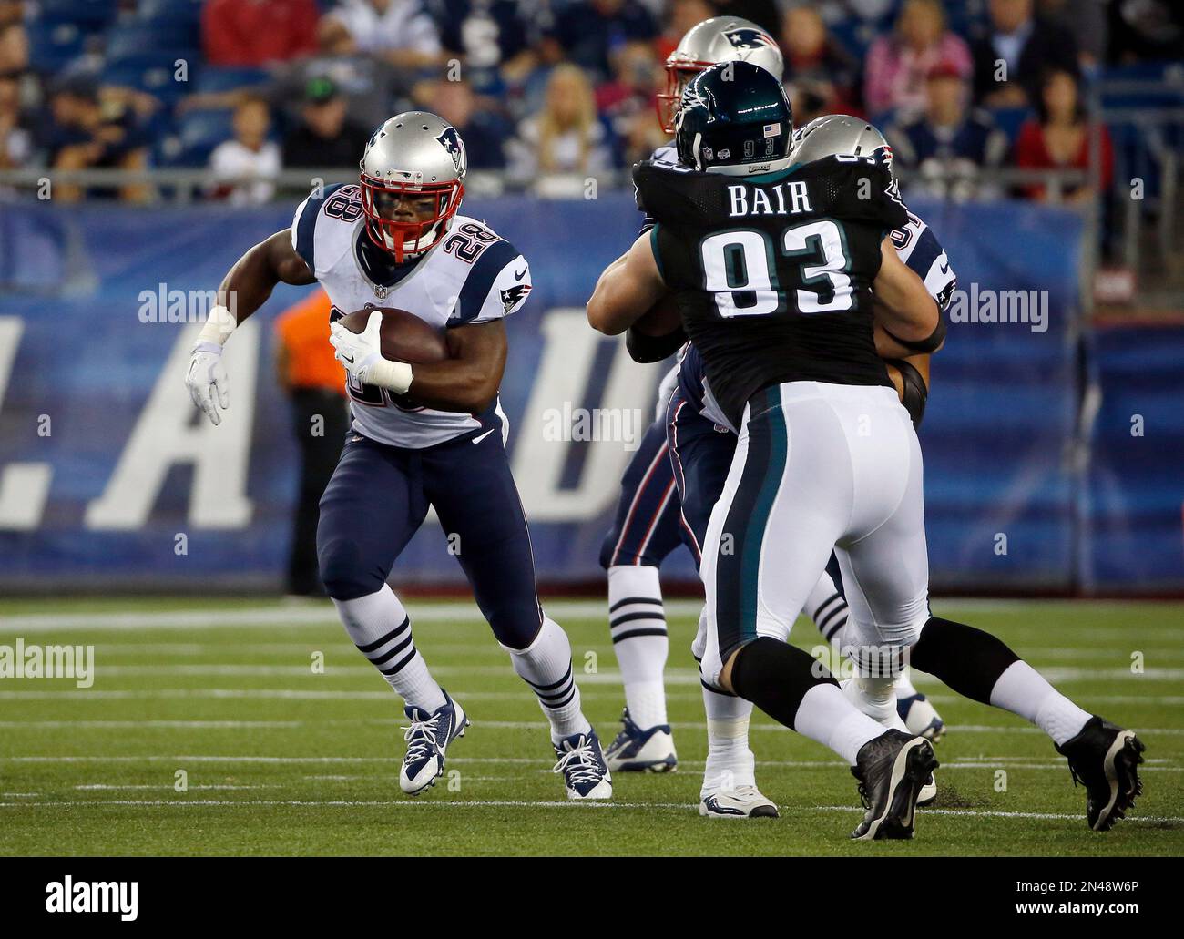 New England Patriots running back James White (28) runs past ...