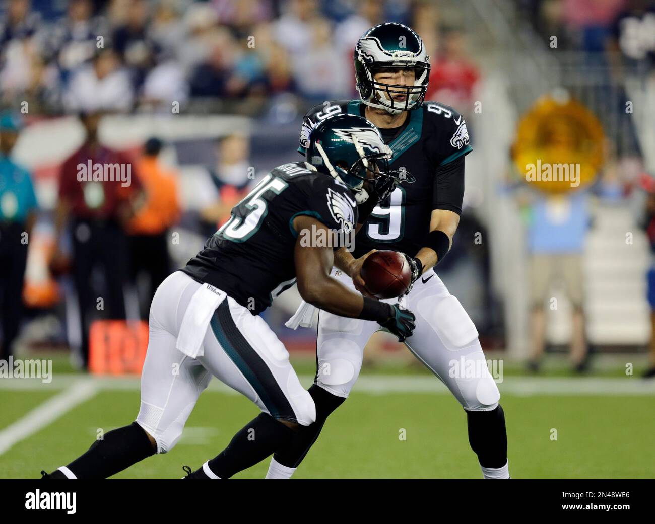 Philadelphia Eagles quarterback Nick Foles (9) hands off to running ...