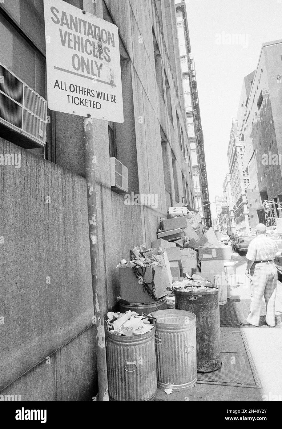 Uncollected garbage is piled up at the New York Health, Hospital and ...