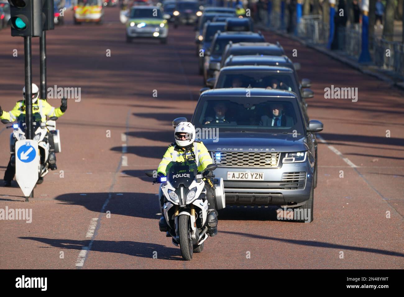 A motorcade carrying Ukrainian President Volodymyr Zelensky travels ...