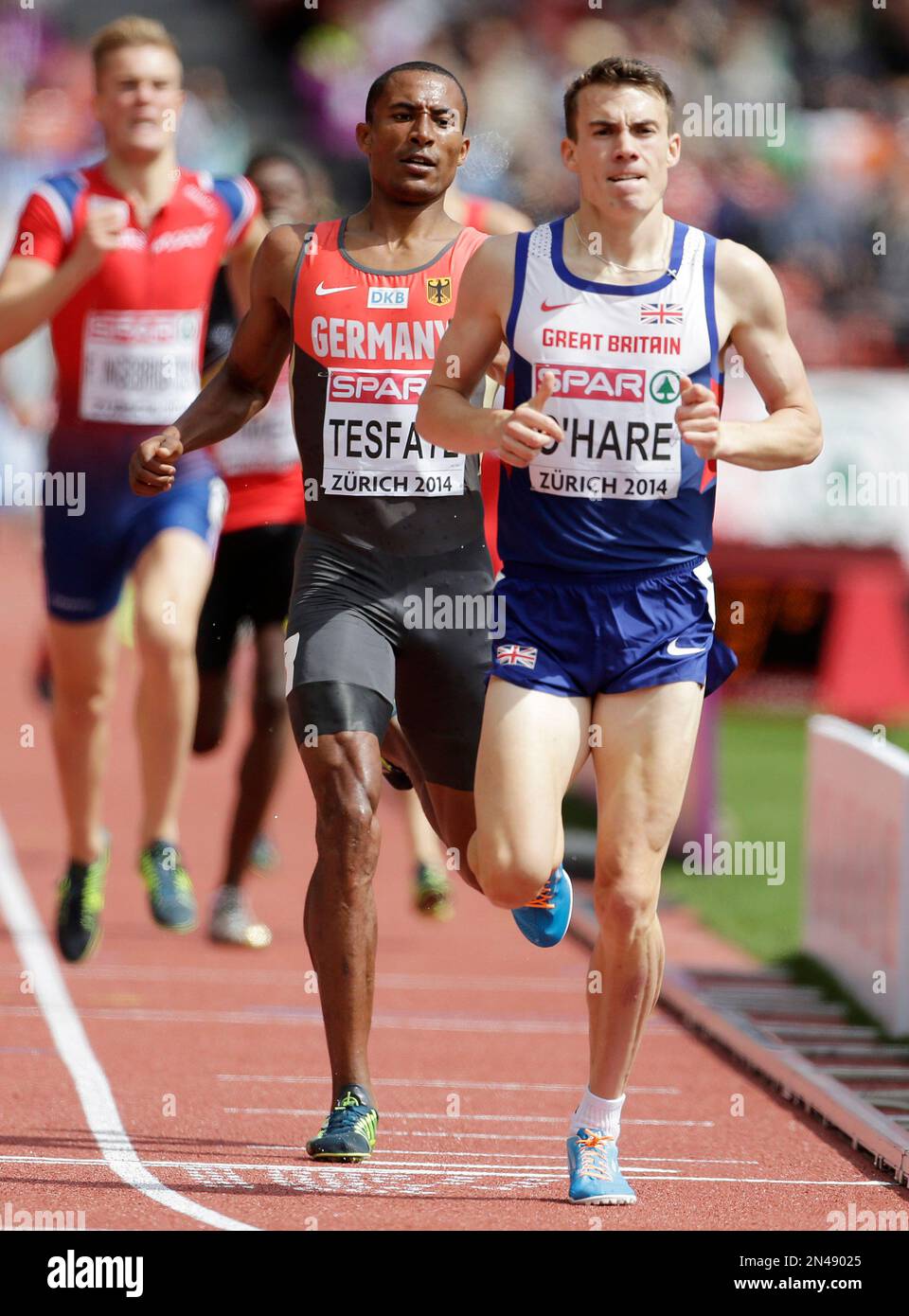 Britain's Chris O'Hare, right, and Germany's Homiyu Tesfaye run in ...