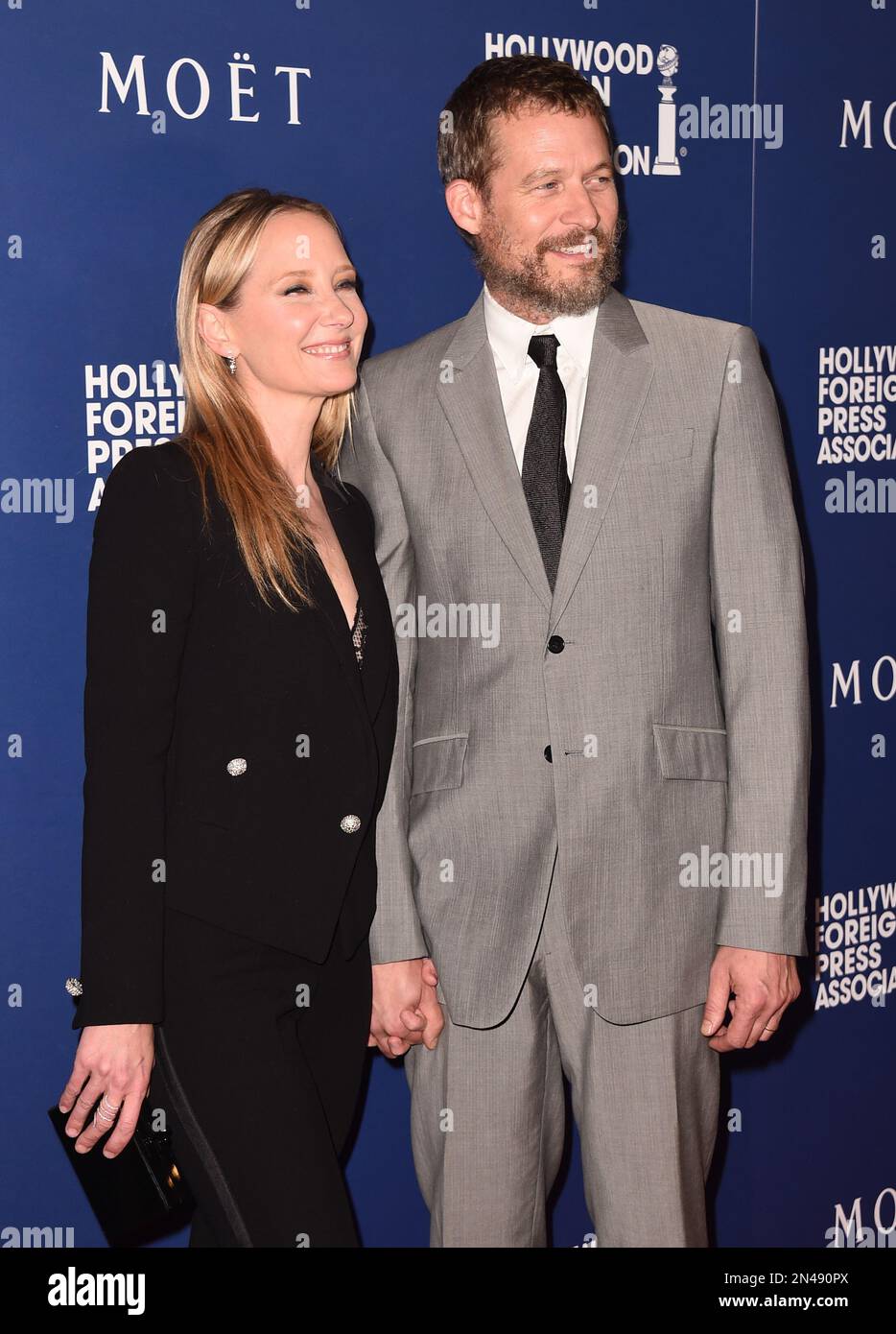 Anne Heche, left, and James Tupper arrive at the Hollywood Foreign ...