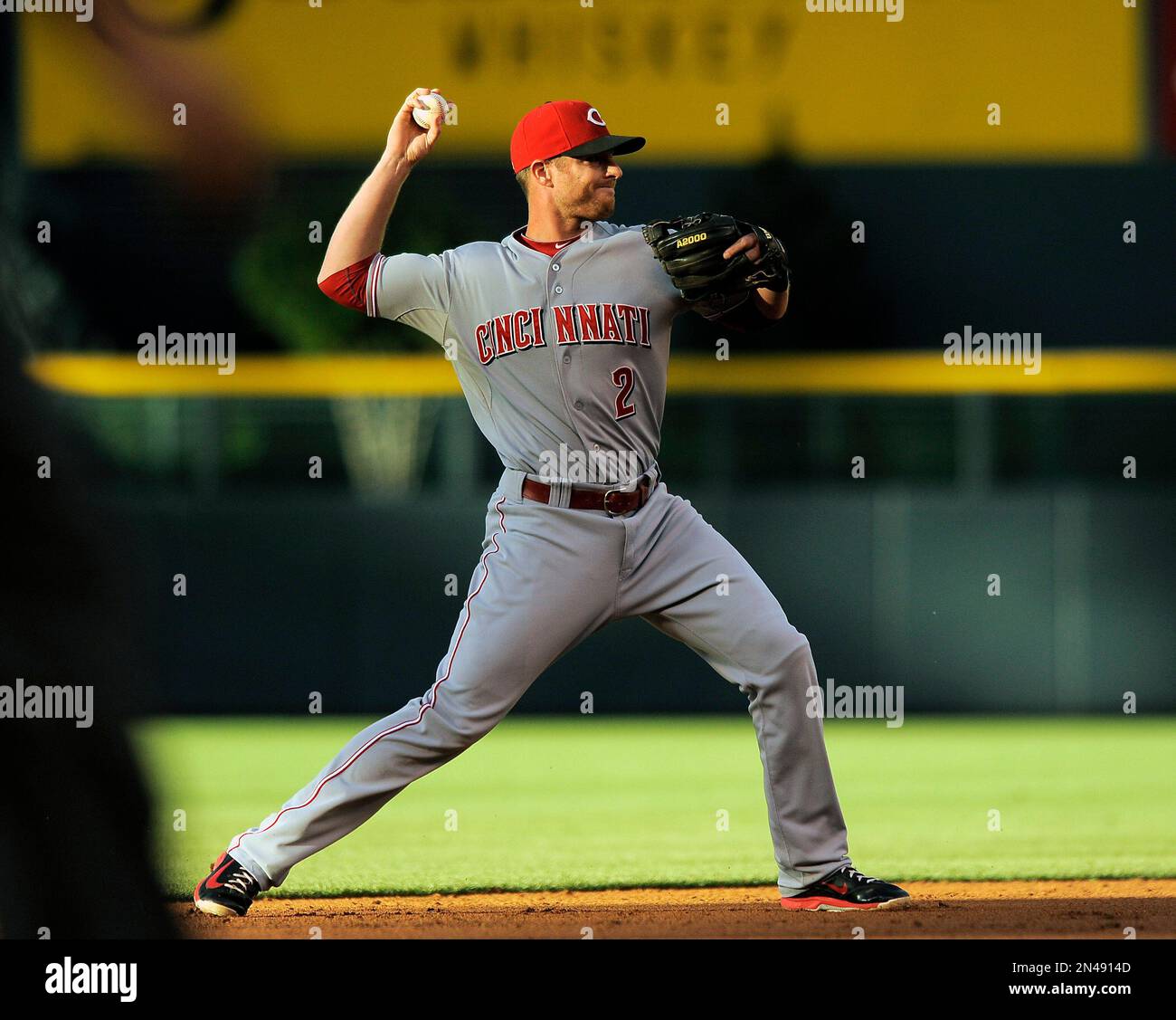 Cincinnati Reds shortstop Zack Cozart throws to first base in the first ...