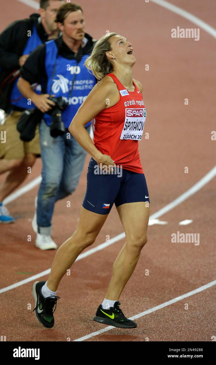 Czech Republic's Barbora Spotakova reacts after winning the gold medal ...