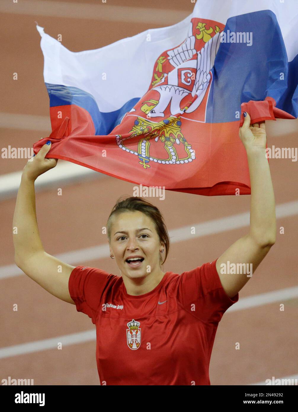 Serbia's Tatjana Jelaca celebrates winning the silver medal in the ...
