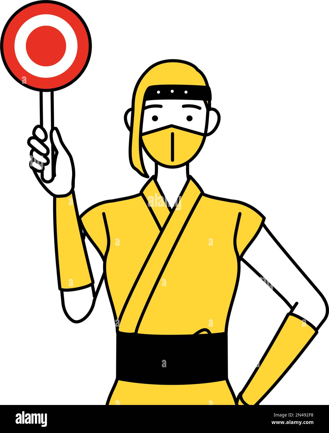 A woman dressed up as a ninja with her hands folded in front of her ...